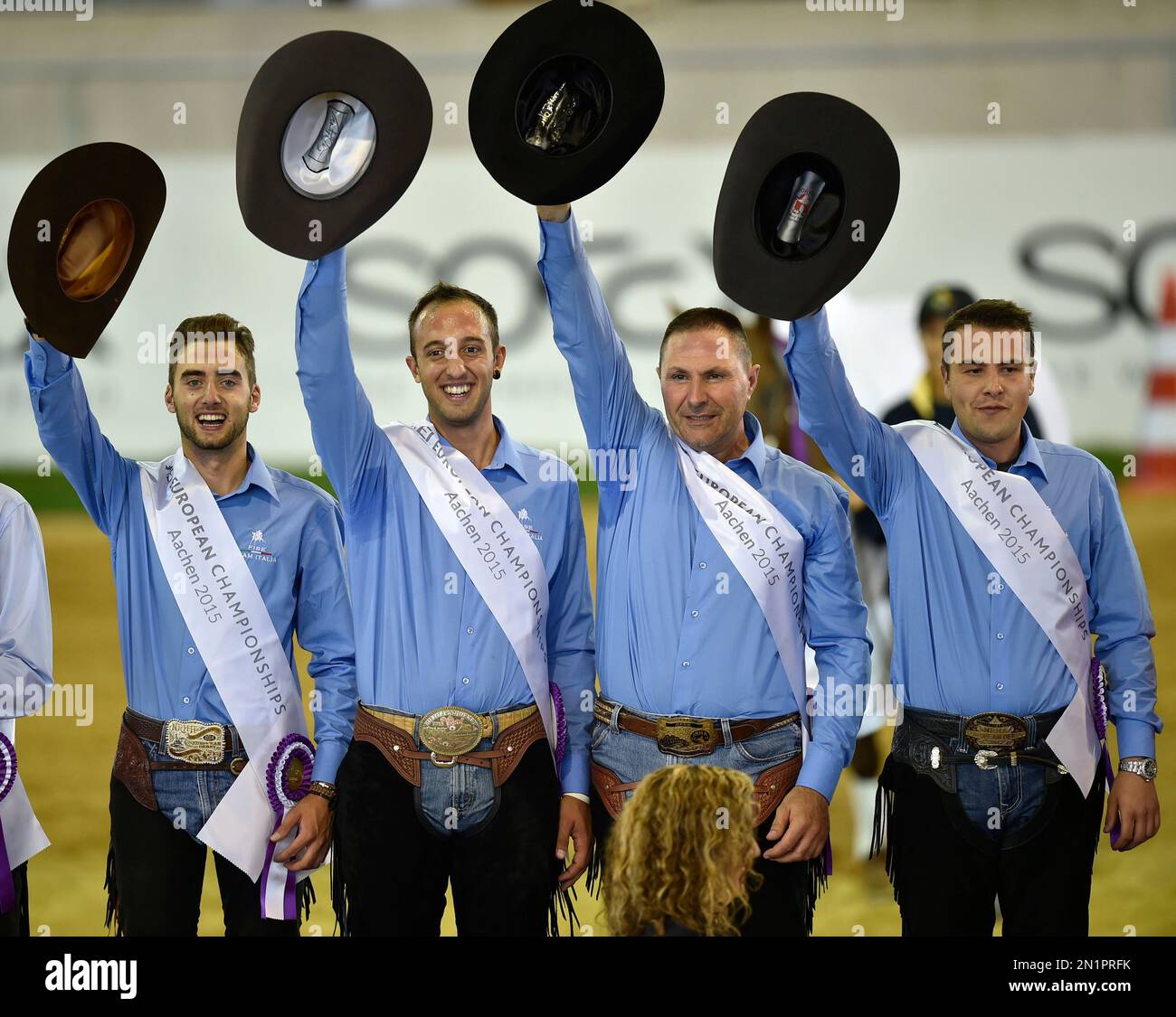 Italy's team celebrates winning the Reining team final at the FEI ...