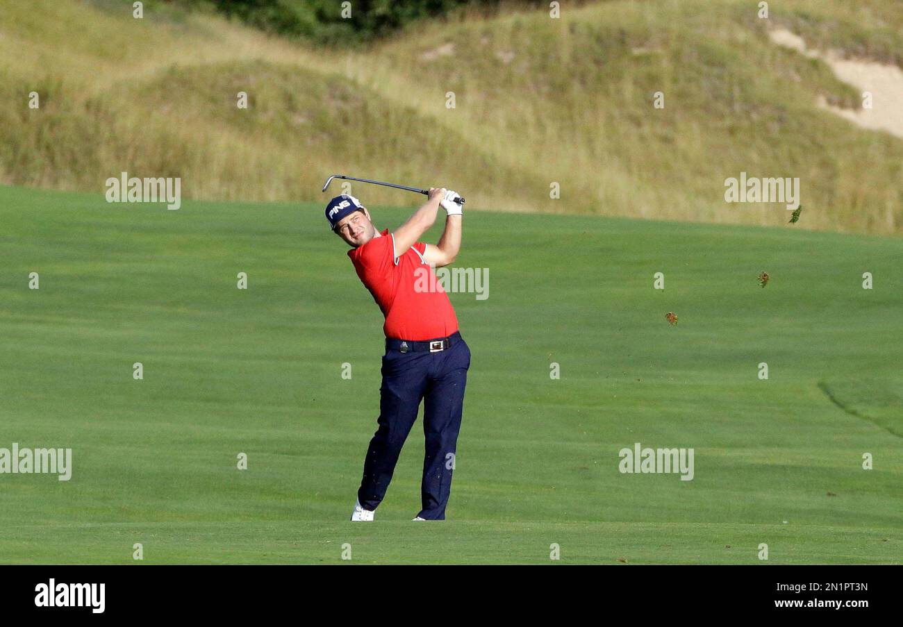David Lingmerth, of Sweden, hits a shot on the first hole during the ...