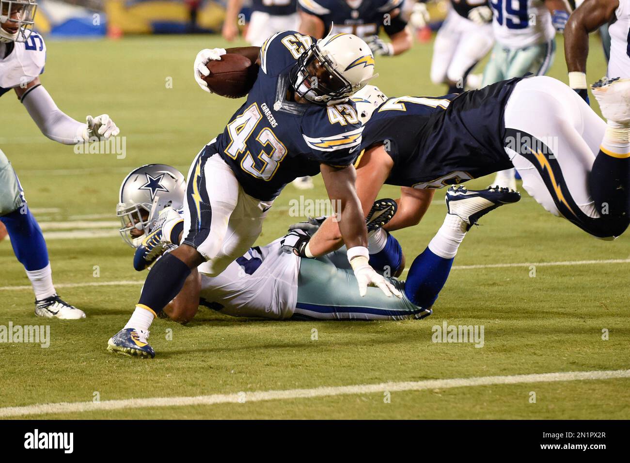 San Diego Chargers running back Branden Oliver (43) breaks free of ...
