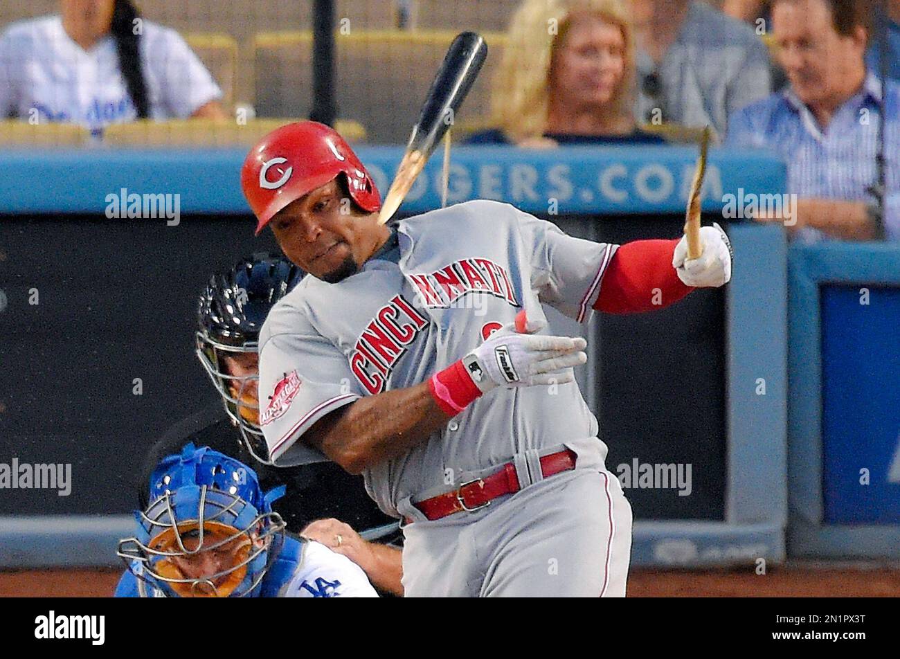 Cincinnati Reds' Marlon Byrd breaks his bat as he hits a foul ball ...