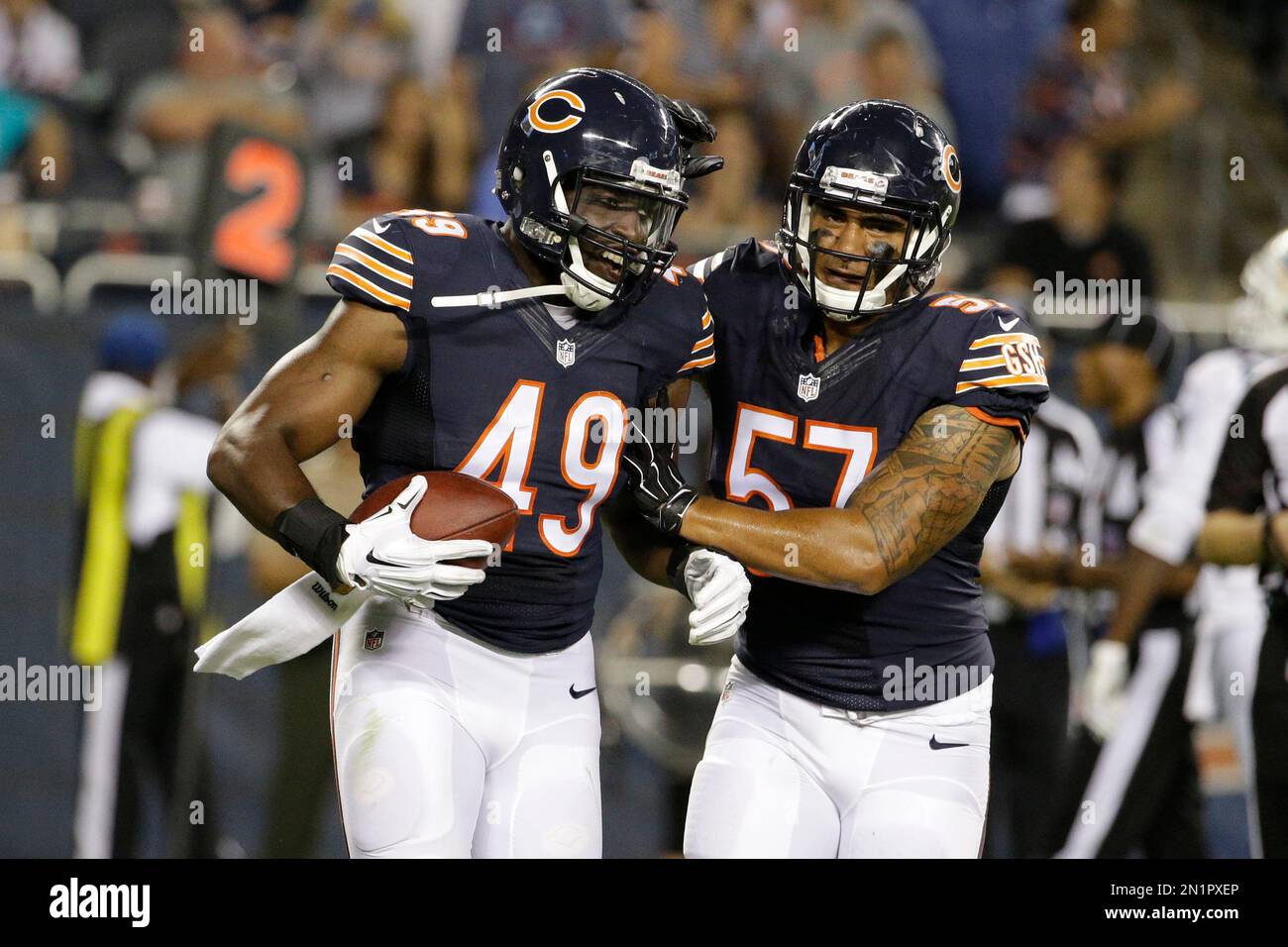 Chicago Bears linebacker Sam Acho (49) celebrates an interception with ...