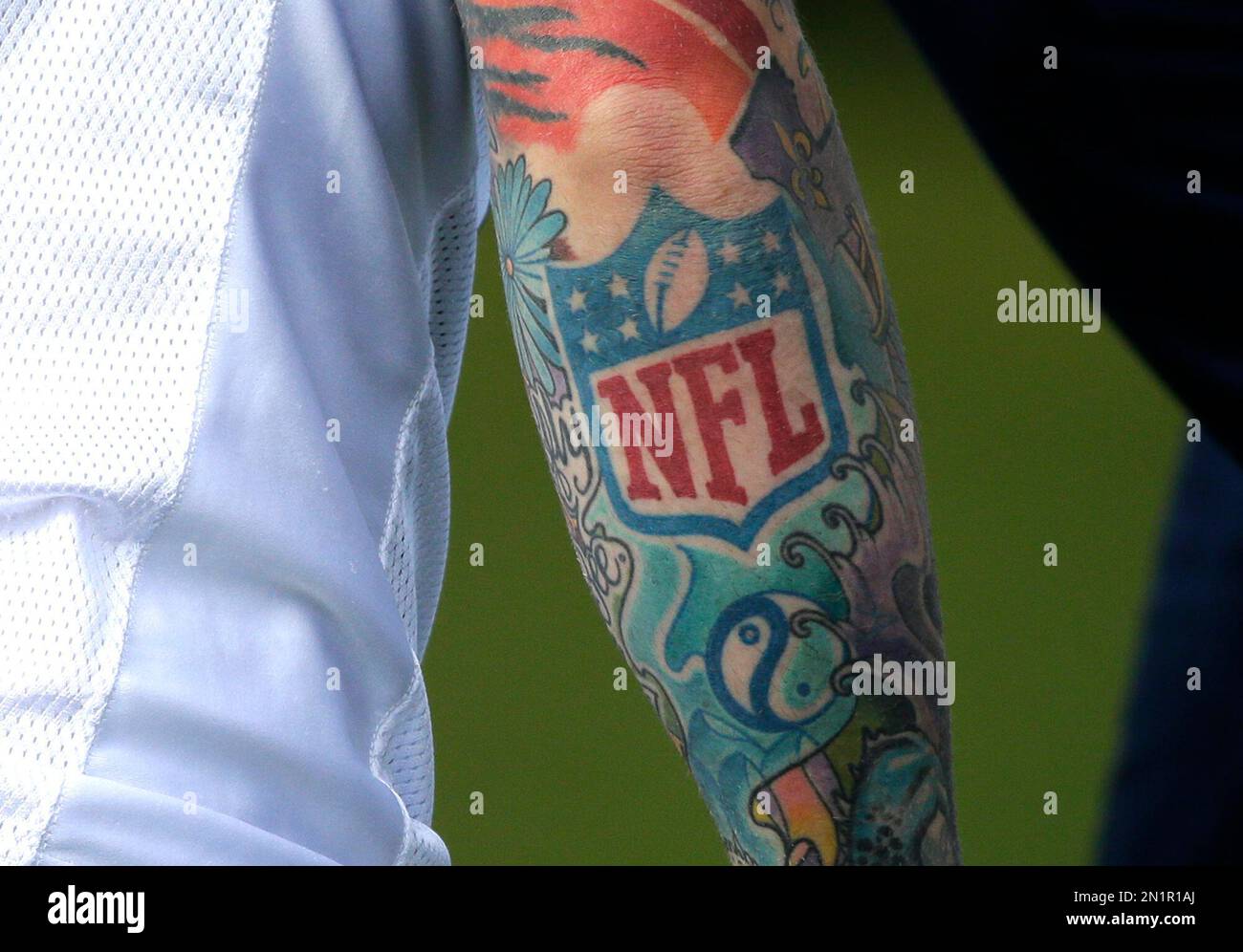 Seattle Seahawks defensive end Cassius Marsh displays his NFL football ...