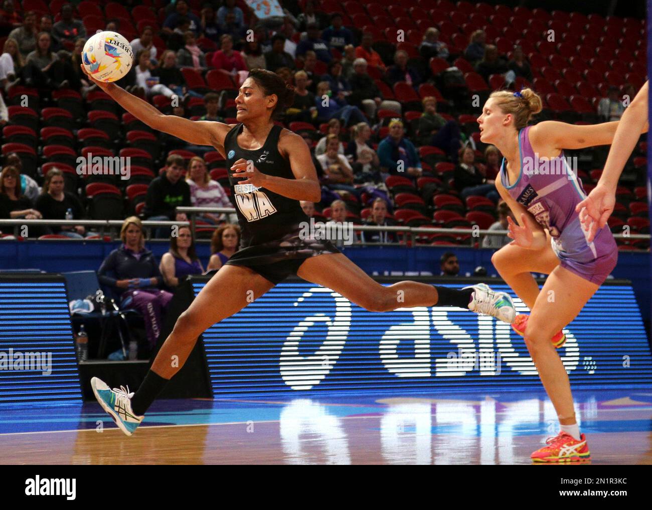 Fiji's Maria Lutua, left, stretches to catch the ball as Scotland's ...