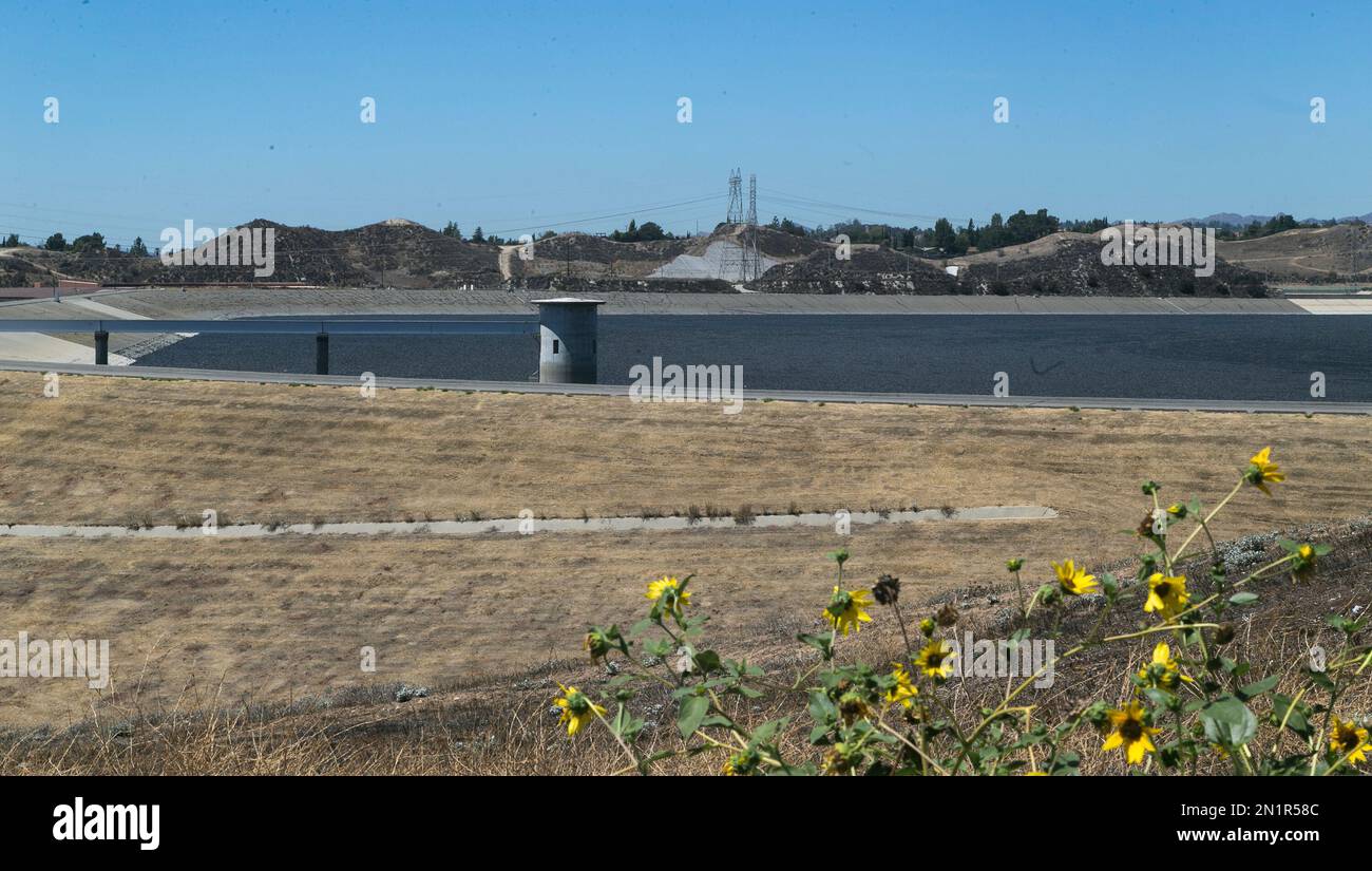 The Los Angeles Reservoir is covered with over 90 million black plastic ...