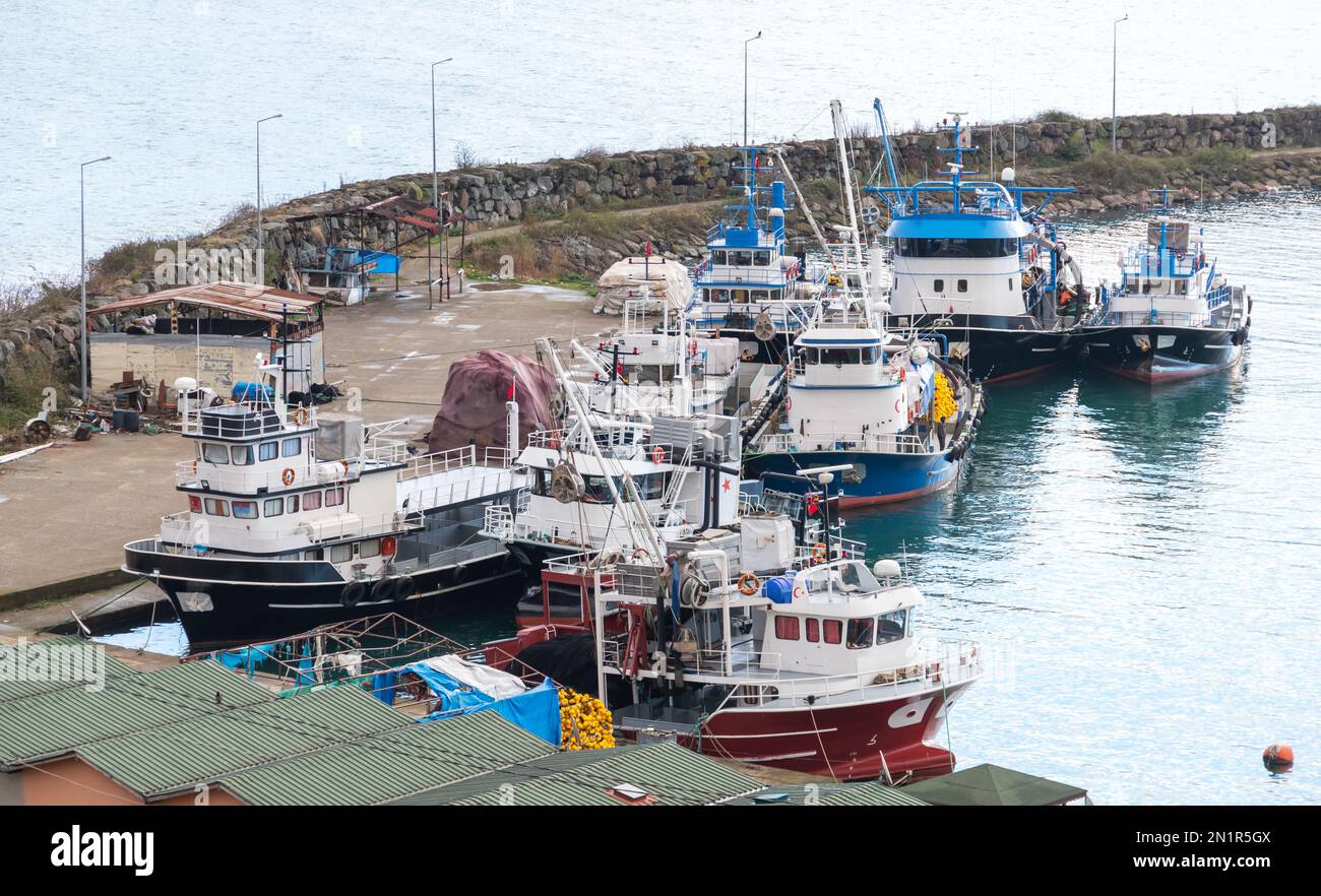 Fleet of fishing vessels moored in harbor of Arakli. Trabzon, Turkey ...