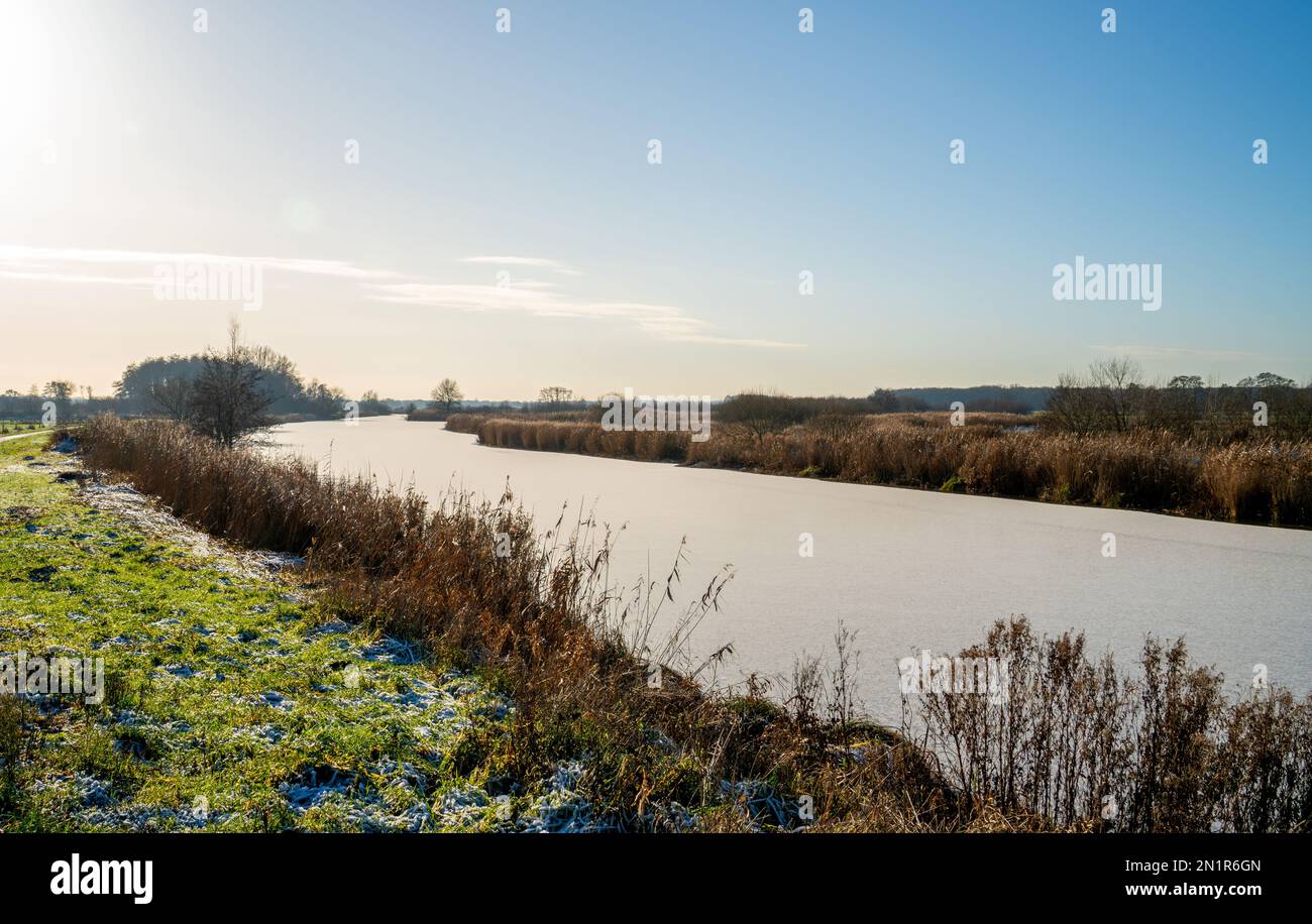 Winter landscape with frozen canal in Drenthe, Netherlands Stock Photo ...