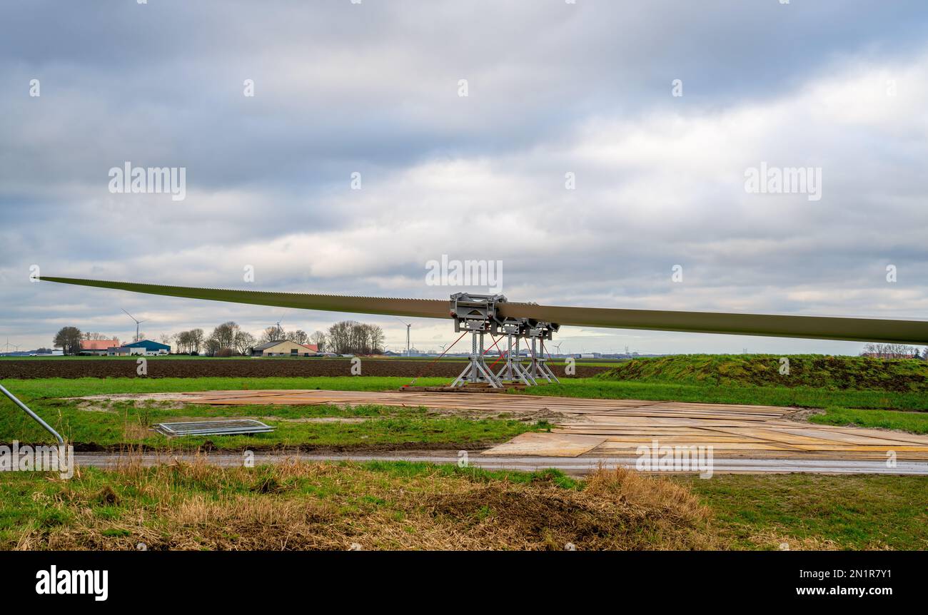 Wings for a large wind turbine under construction Stock Photo - Alamy