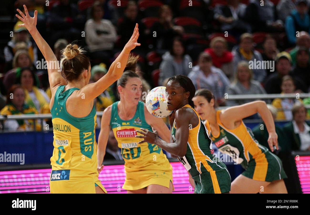South Africa's Bongiwe Msomi, center, is blocked by Australia's ...