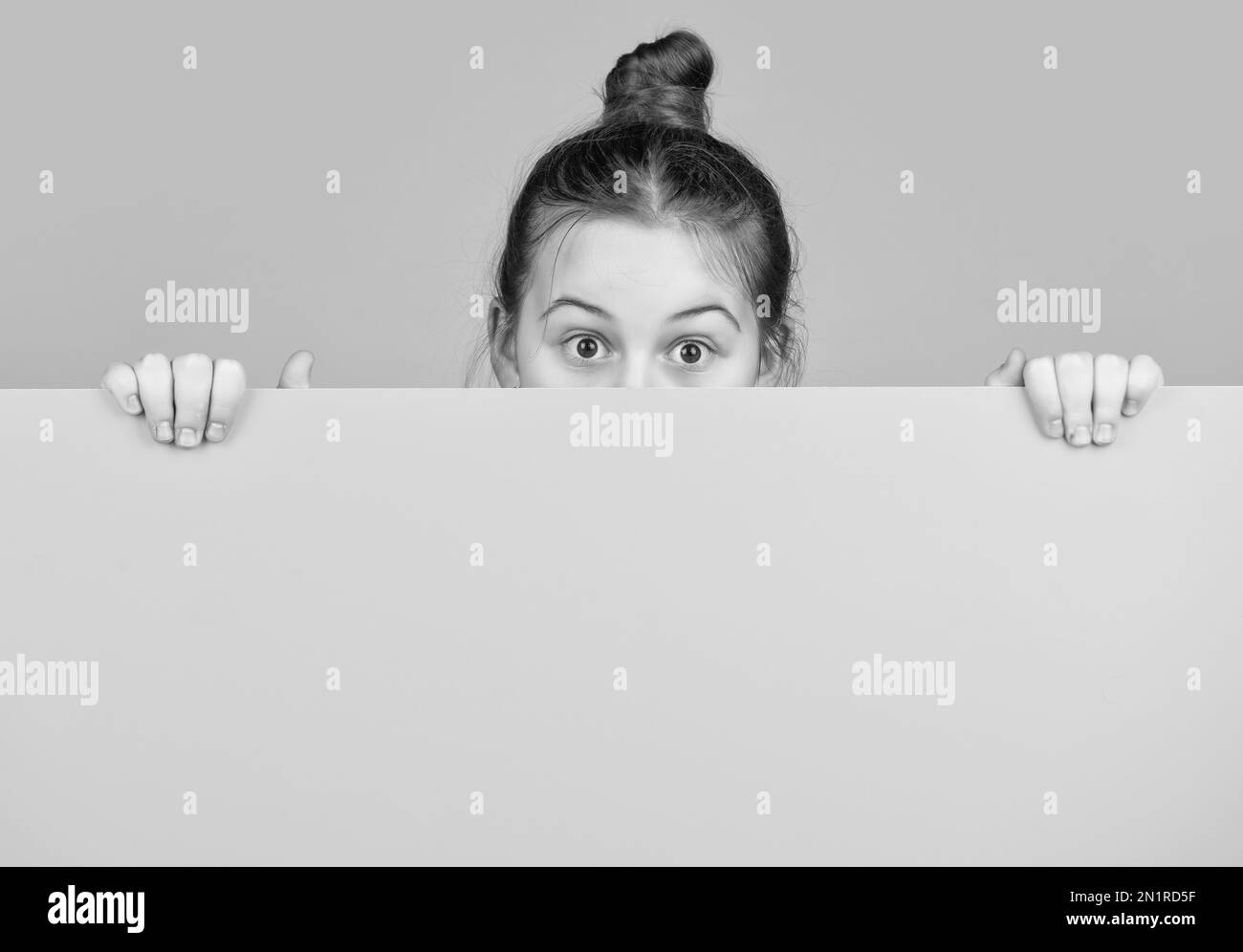 Black child hiding behind Black and White Stock Photos & Images - Alamy
