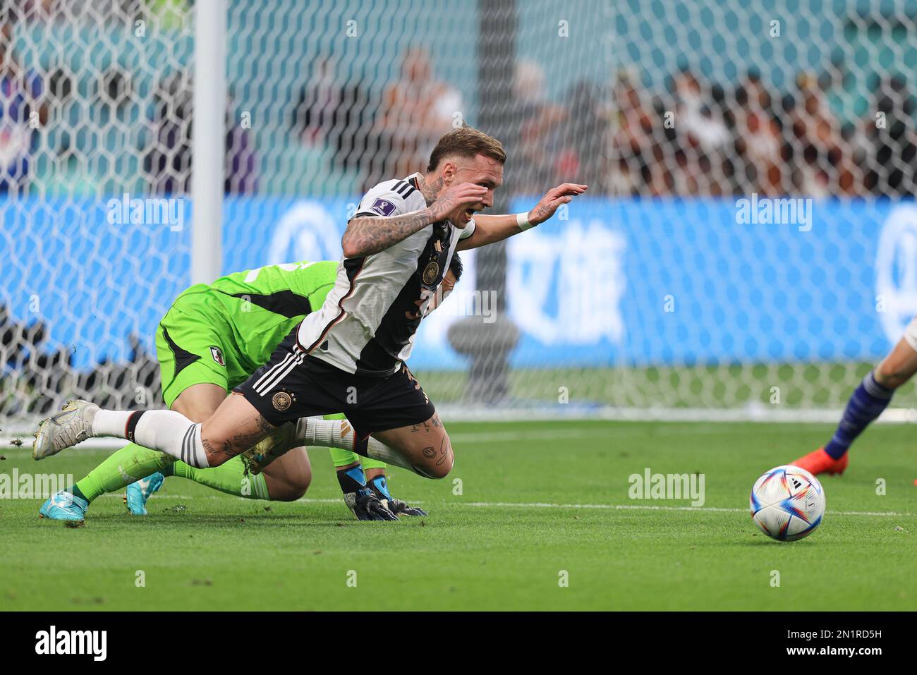 AR-RAJJAN, QATAR - NOVEMBER 23: David Raum, Shuichi Gonda during the ...