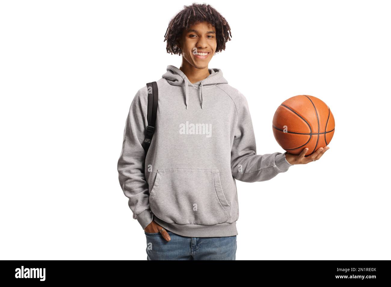 Male african american student holding a basketball and smiling isolated ...