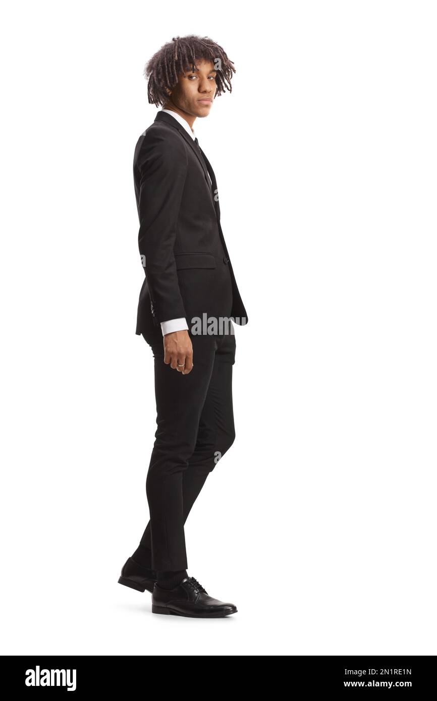 Full length shot of a young african american male model in a suit and ...