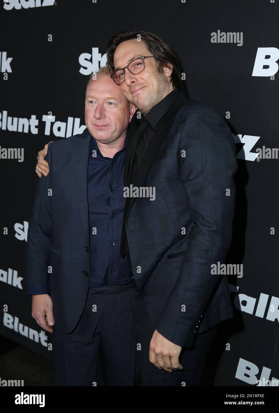 Adrian Scarborough, left, and Timm Sharp arrive at the Los Angeles ...
