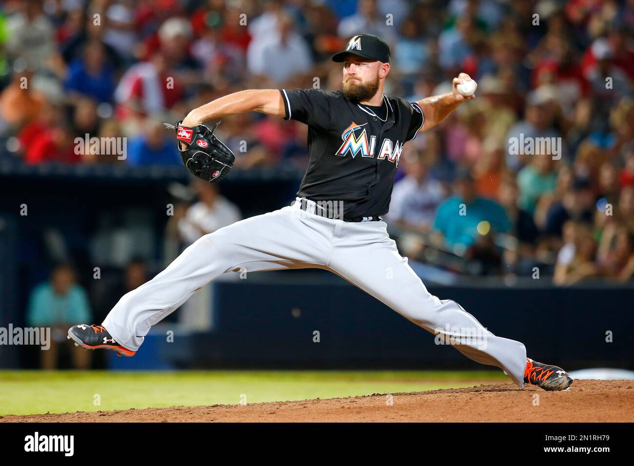 Miami Marlins relief pitcher Mike Dunn (40) delivers in the seventh ...