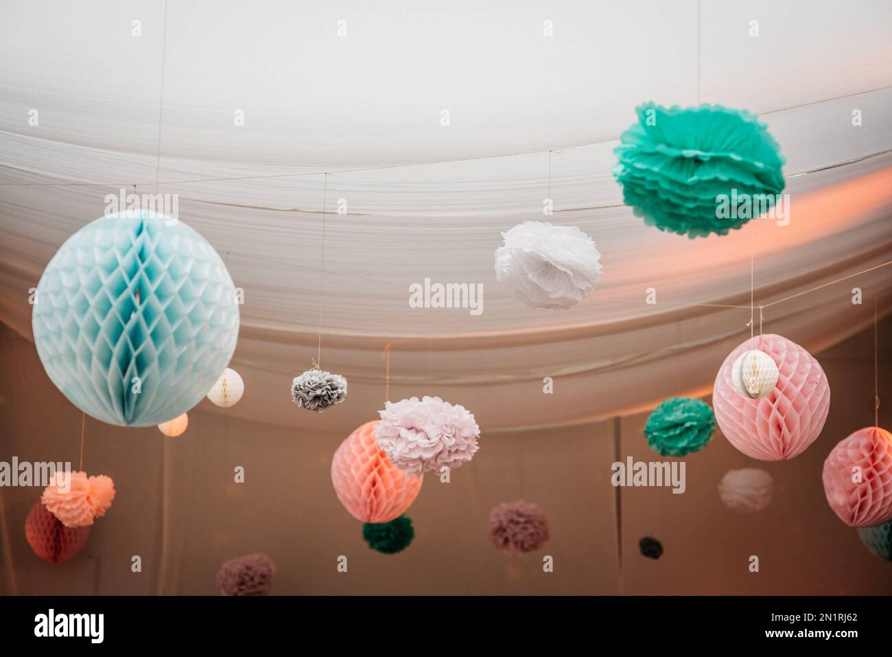 Beautiful colorful decorations hanging down from the ceiling in a ...