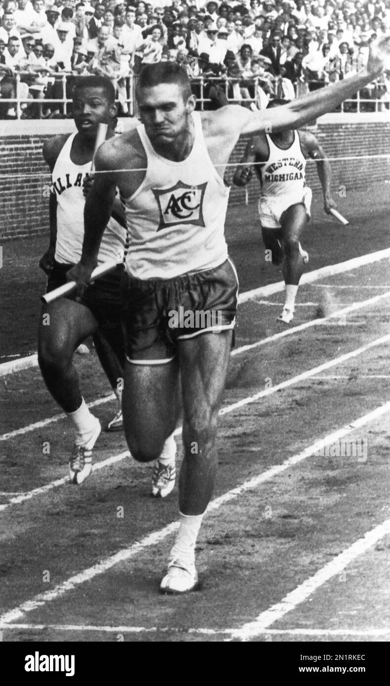 Earl Young of Abilene Christian is about to break the tape to win the ...