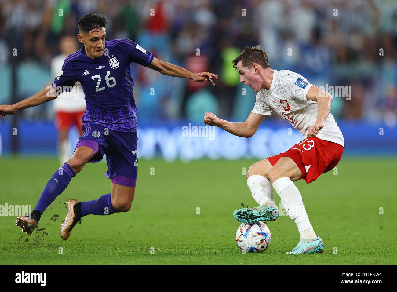DOHA, QATAR - NOVEMBER 30: Nahuel Molina, Jakub Kaminski during the ...