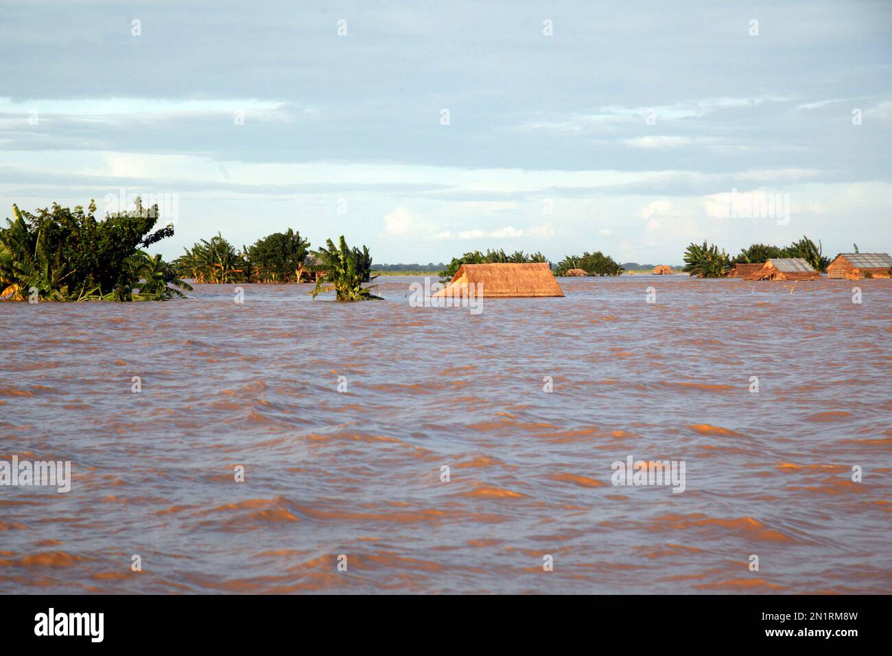 In this Sunday, Aug. 9, 2015 photo, roofs of flooded residences are ...