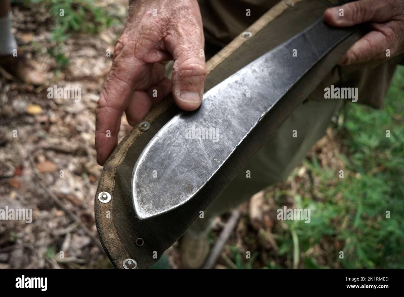 In this June 18, 2015, photo, Rod Beattie shows how his machete has ...