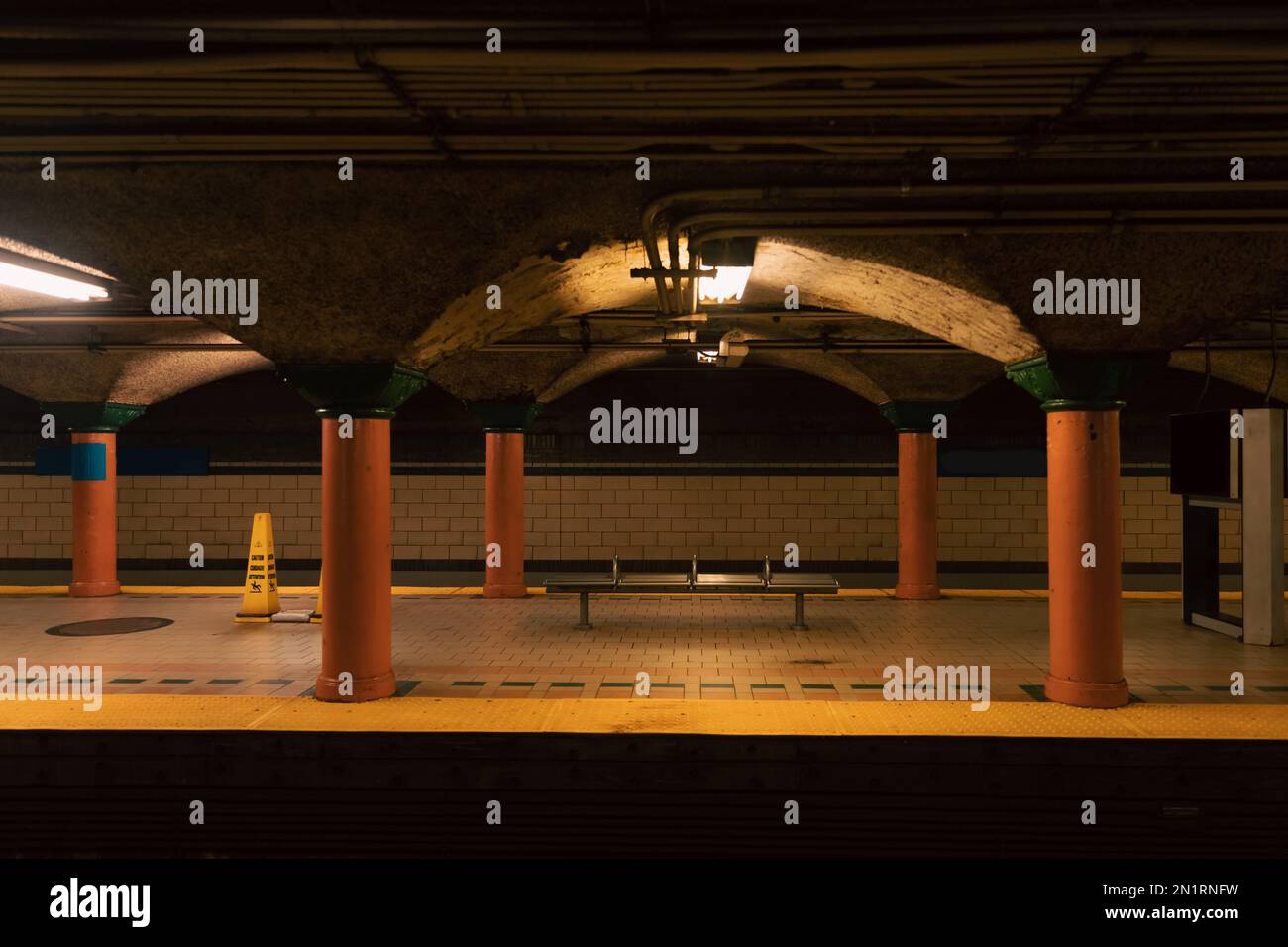 subway station with columns and bench in New York City,stock image ...