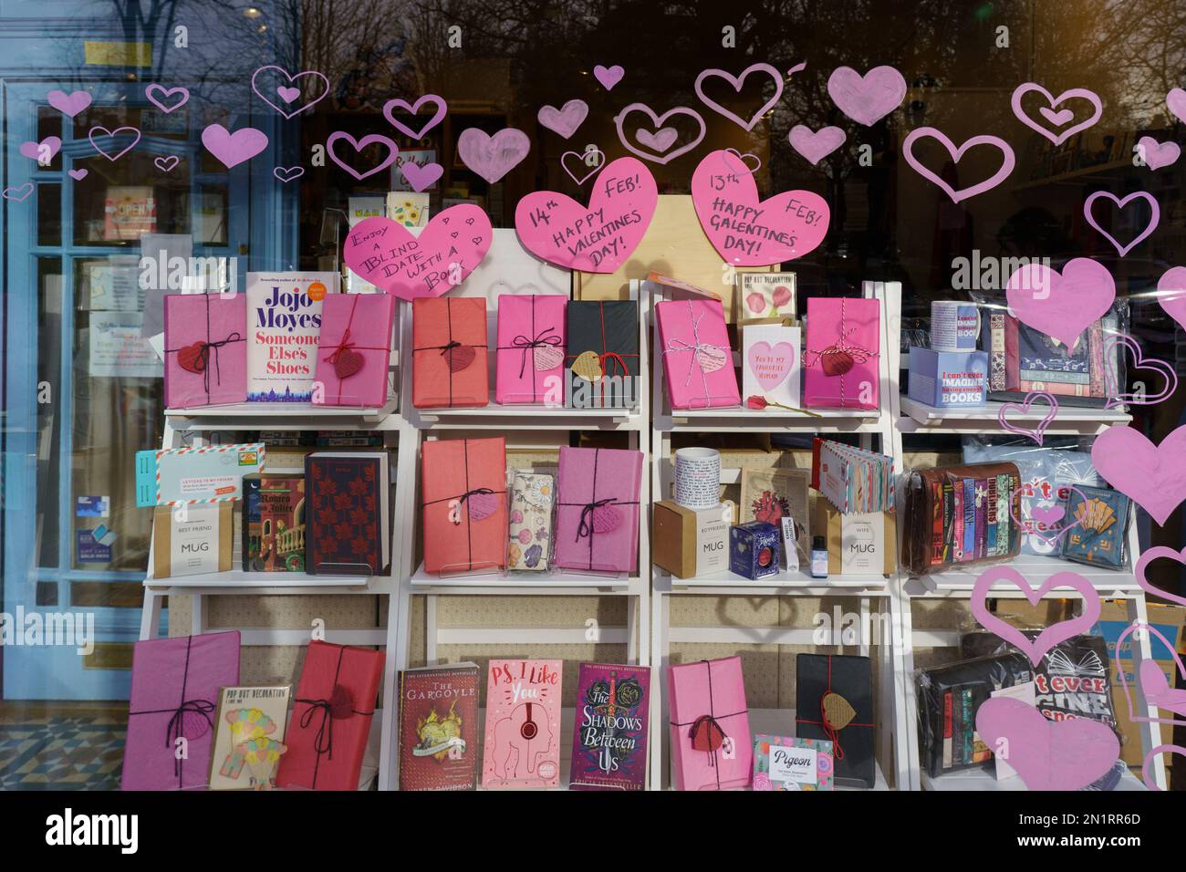 Valentine's Day window display with books, mugs, other items, presents ...