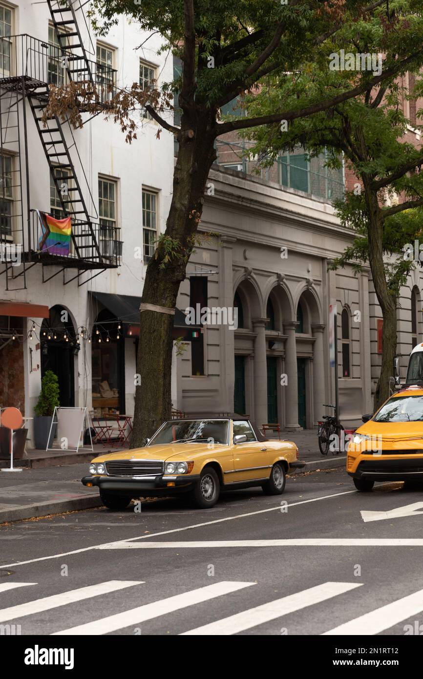 Retro car on urban street near buildings in New York City,stock image ...