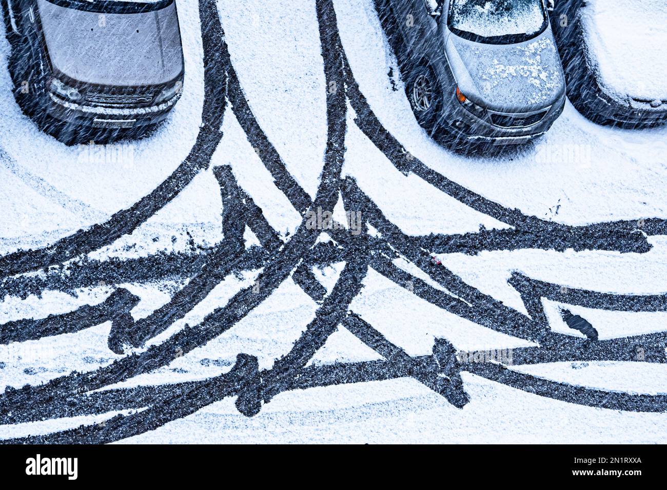 Russia, Moscow. Car tyre trails in the snow Stock Photo - Alamy