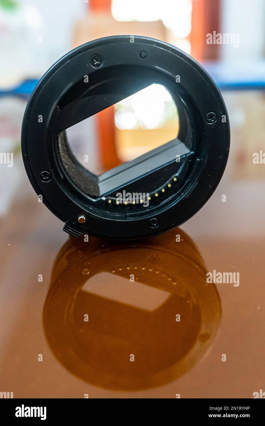 Portrait view of Macro extension tubes on glass background. Two ...