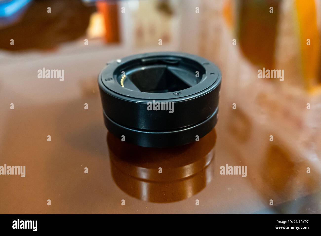 Metal Macro extension tubes on glass background. Two separated ...