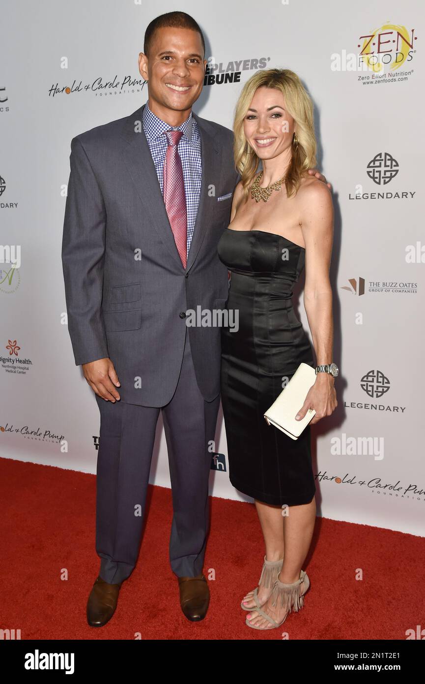 Miles Simon, left, and Kristy Simon arrive at the 15th Annual Harold ...