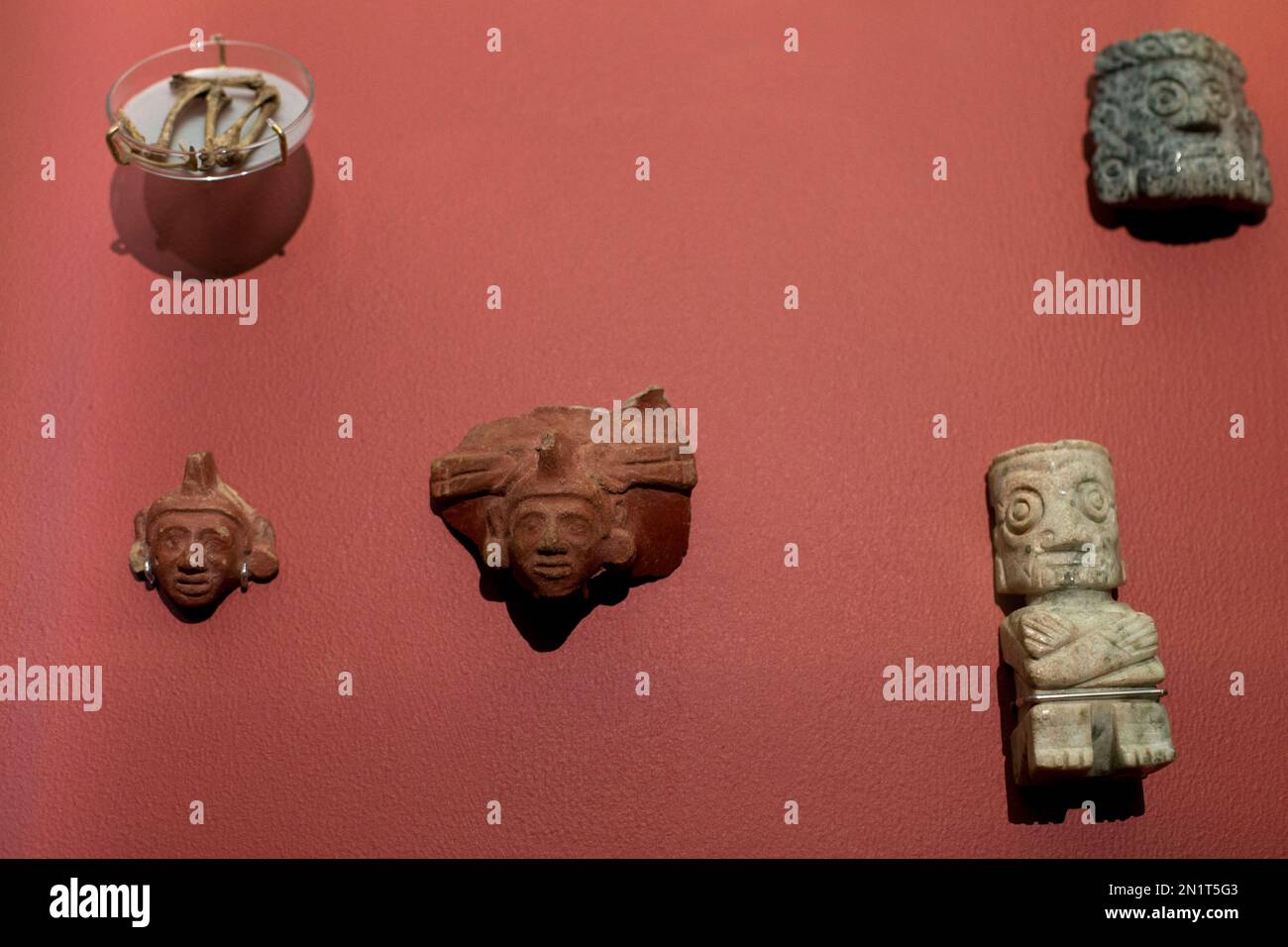 An image of the Aztec god Xochipilli, center, is part of a display of ...