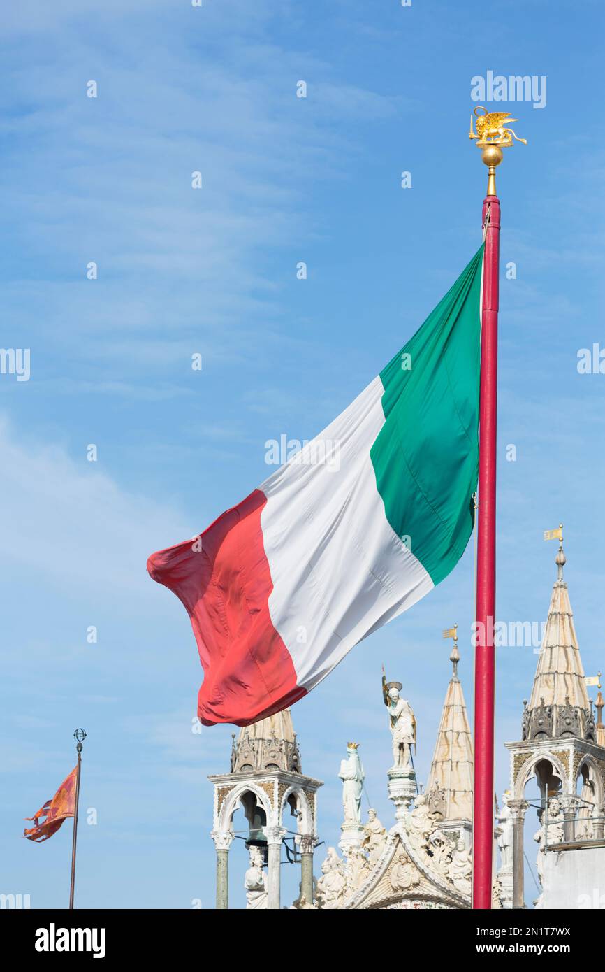Italy, Venice, the flag of Italy and the Basilica Di San Marco Stock ...