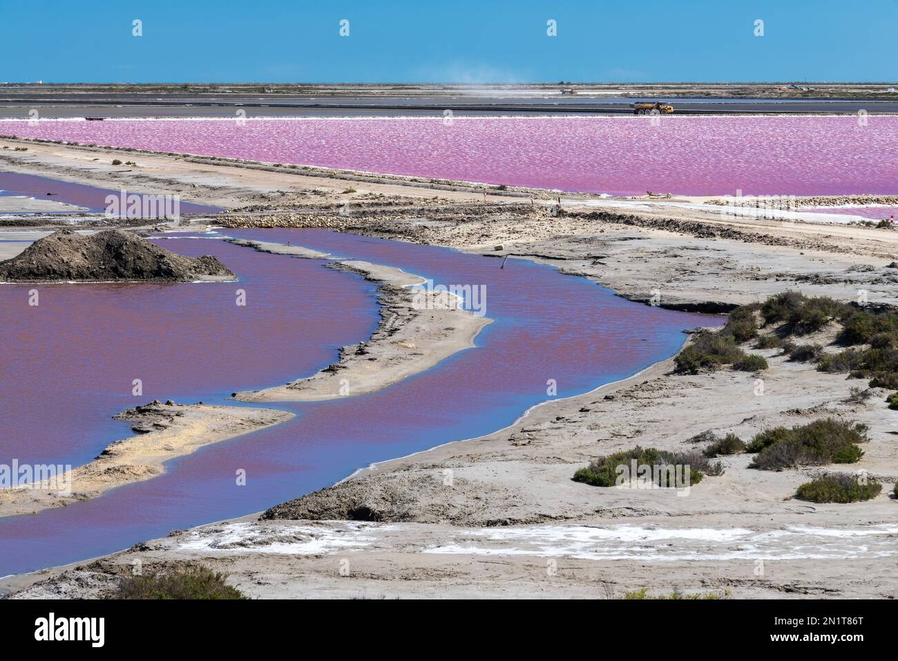 Abstract landscape of pink salt pans at Salin de Giraud saltworks in ...