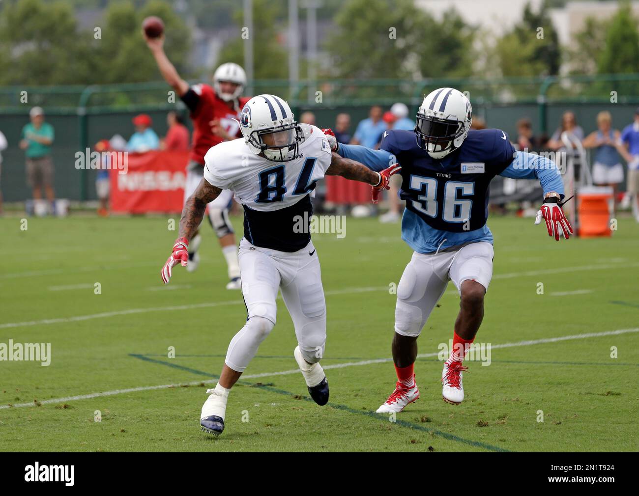 Tennessee Titans wide receiver Deon Long (84) is defended by cornerback ...