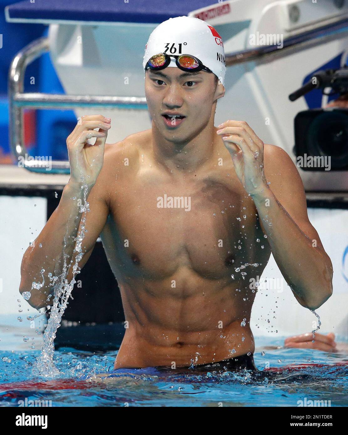 China's Ning Zetao celebrates after winning the men's 100m freestyle ...
