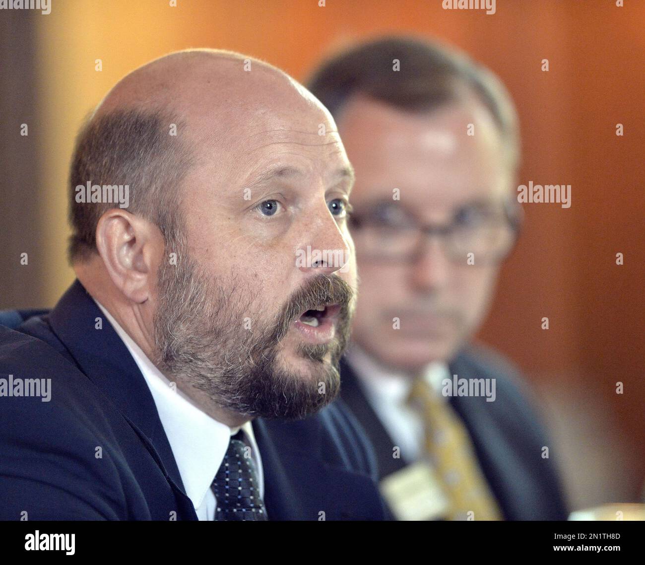 Craig Potts, left, with the Kentucky Heritage Council, speaks to the ...