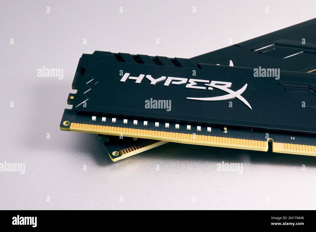 HyperX DDR4 RAM modules on a silver surface close-up. Parts for building and upgrading a PC ...