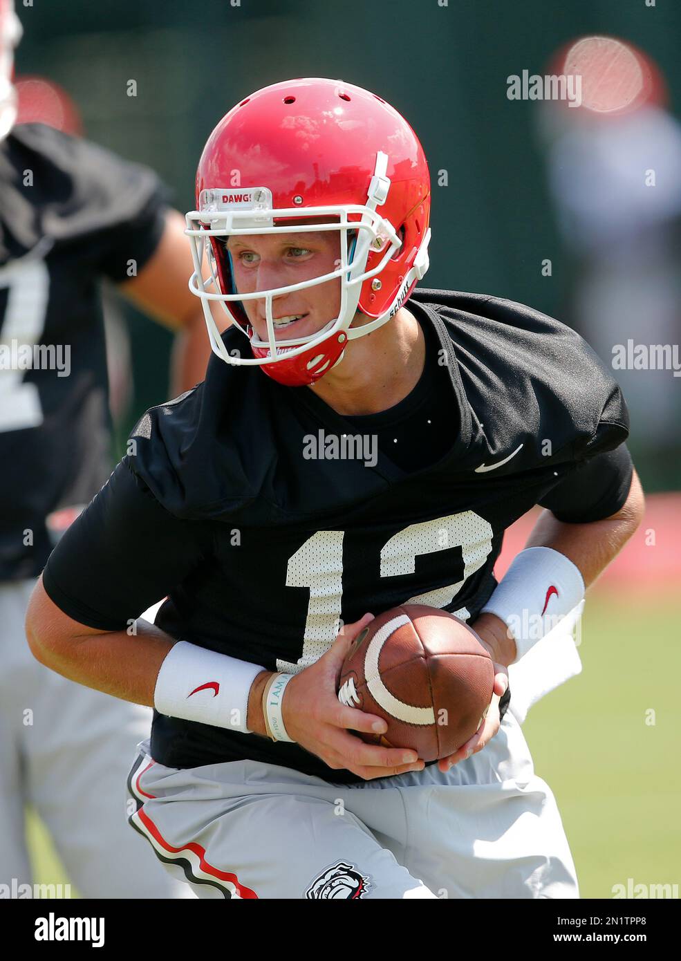 Georgia Quarterback Brice Ramsey hands off during a college football ...