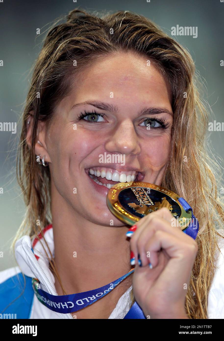 Russia's gold medalist Yuliya Efimova poses after the medal ceremony ...