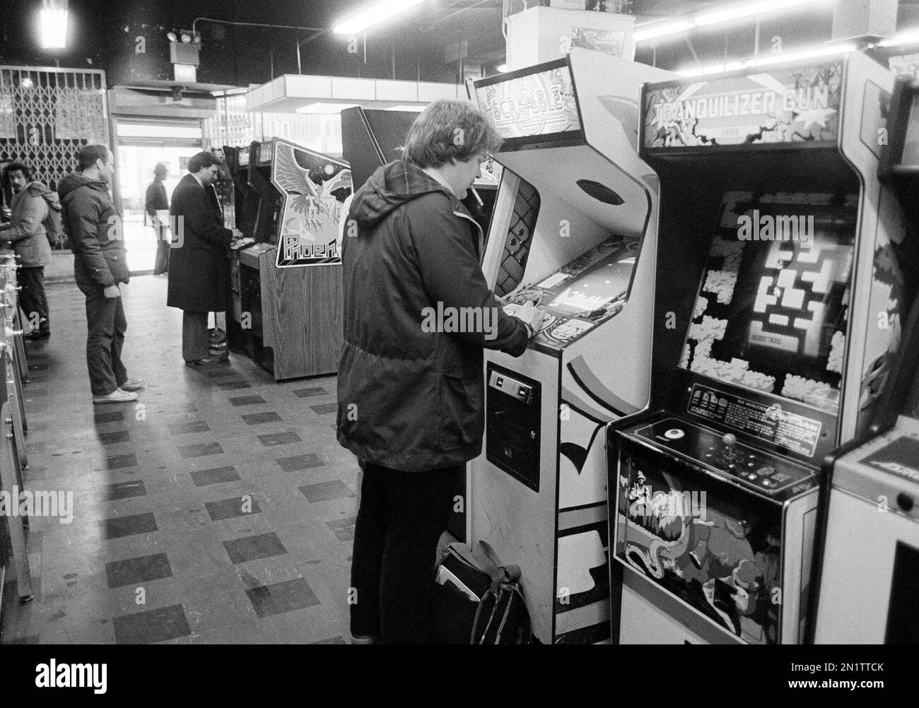 People play video games at a Broadway arcade not far from Times Square ...