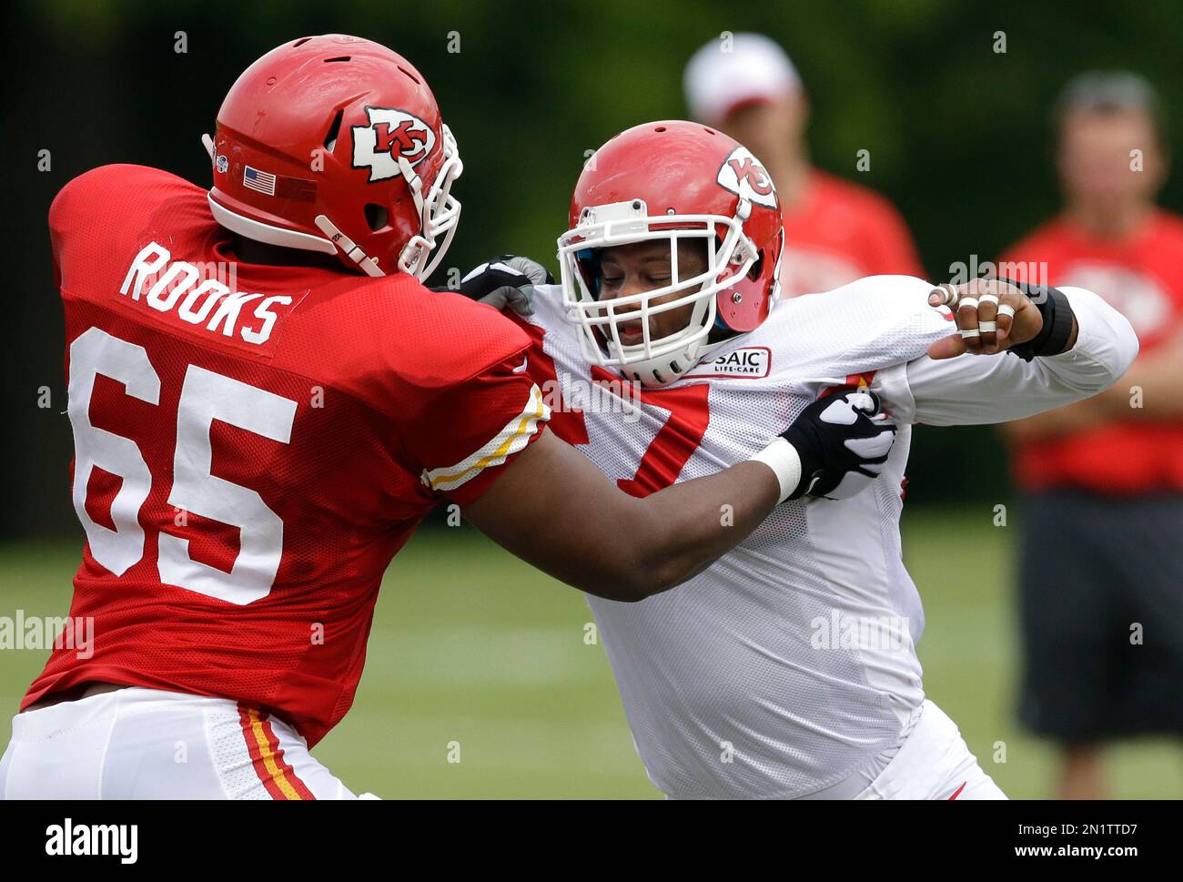Kansas City Chiefs tackle Tavon Rooks (65) blocks linebacker Sage ...