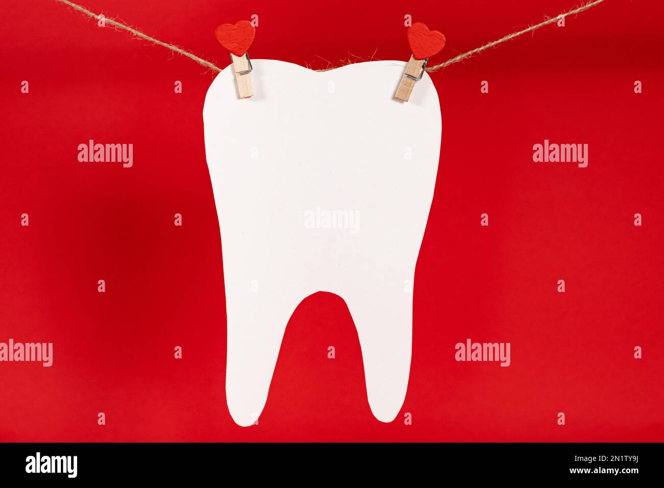 White string heart teeth hi-res stock photography and images - Alamy