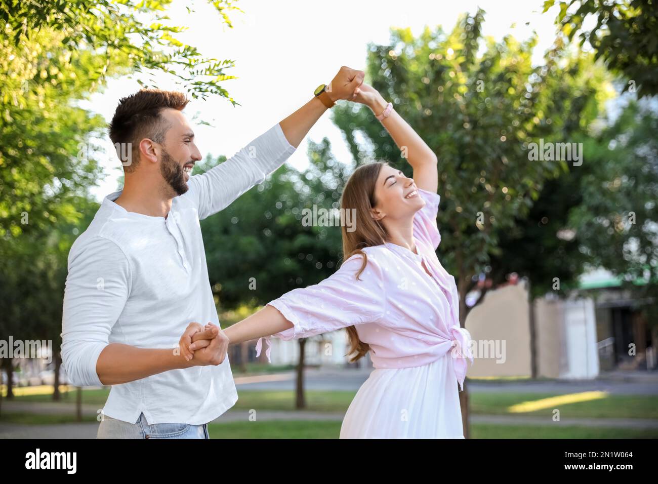 Passionate couple dancing outdoors cute hi-res stock photography and ...