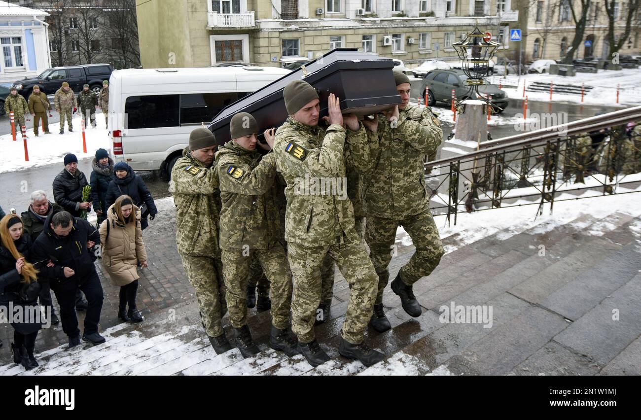 KYIV, UKRAINE - FEBRUARY 6, 2023 - Servicemen carry the coffin of ...