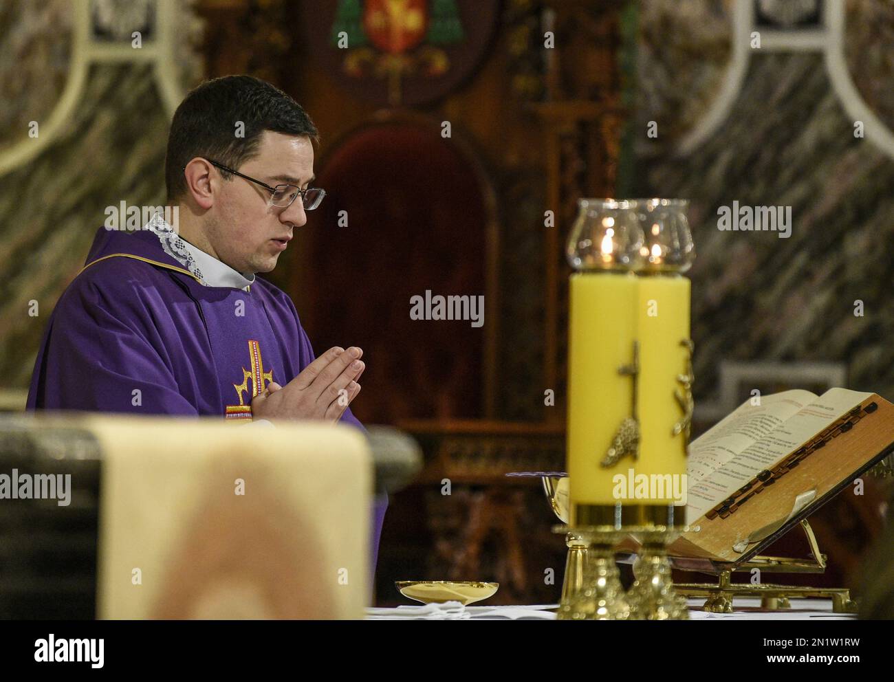 KYIV, UKRAINE - FEBRUARY 6, 2023 - A priest conducts the memorial ...