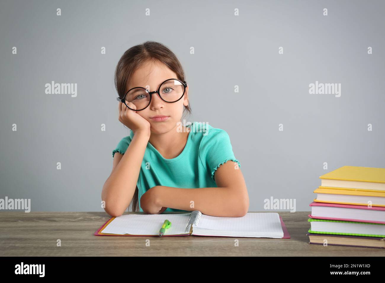 Confused kid on study table hi-res stock photography and images - Alamy