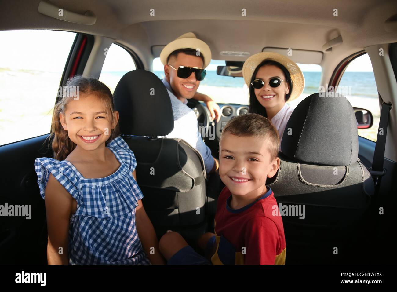Happy family in car hi-res stock photography and images - Alamy