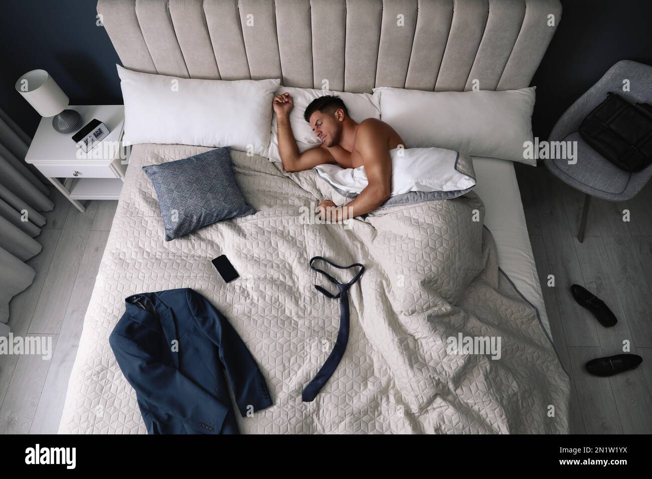 Man Sleeping In Bed From Above