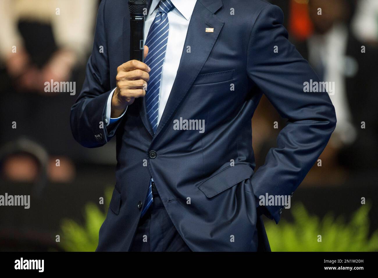 President Barack Obama puts his hand in his pocket while addressing the ...