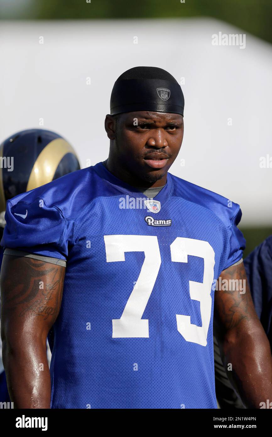St. Louis Rams tackle Greg Robinson pauses between drills during ...